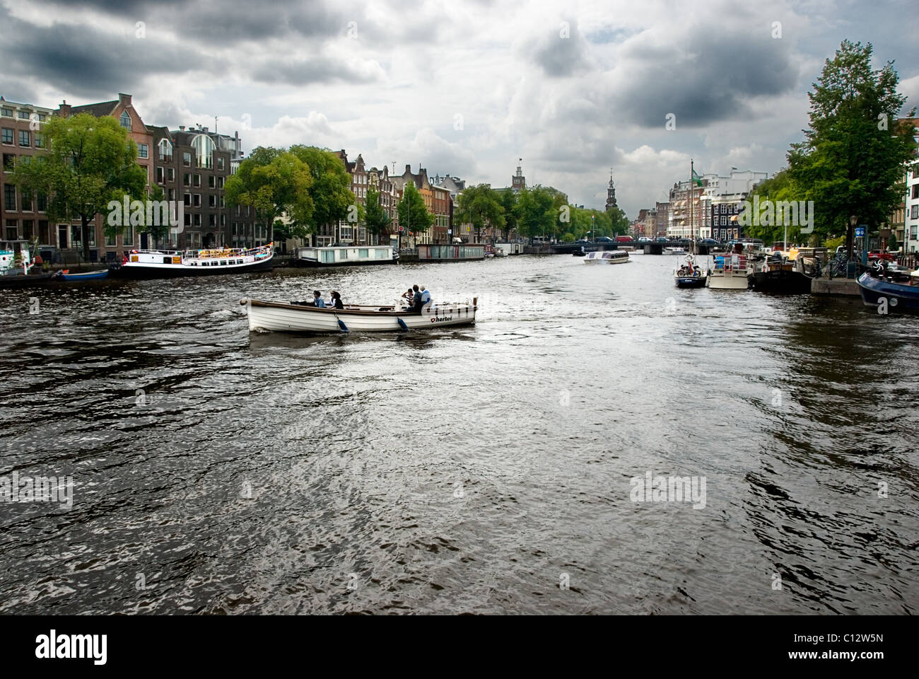 Canal boats in Amsterdam, Holland Stock Photo - Alamy
