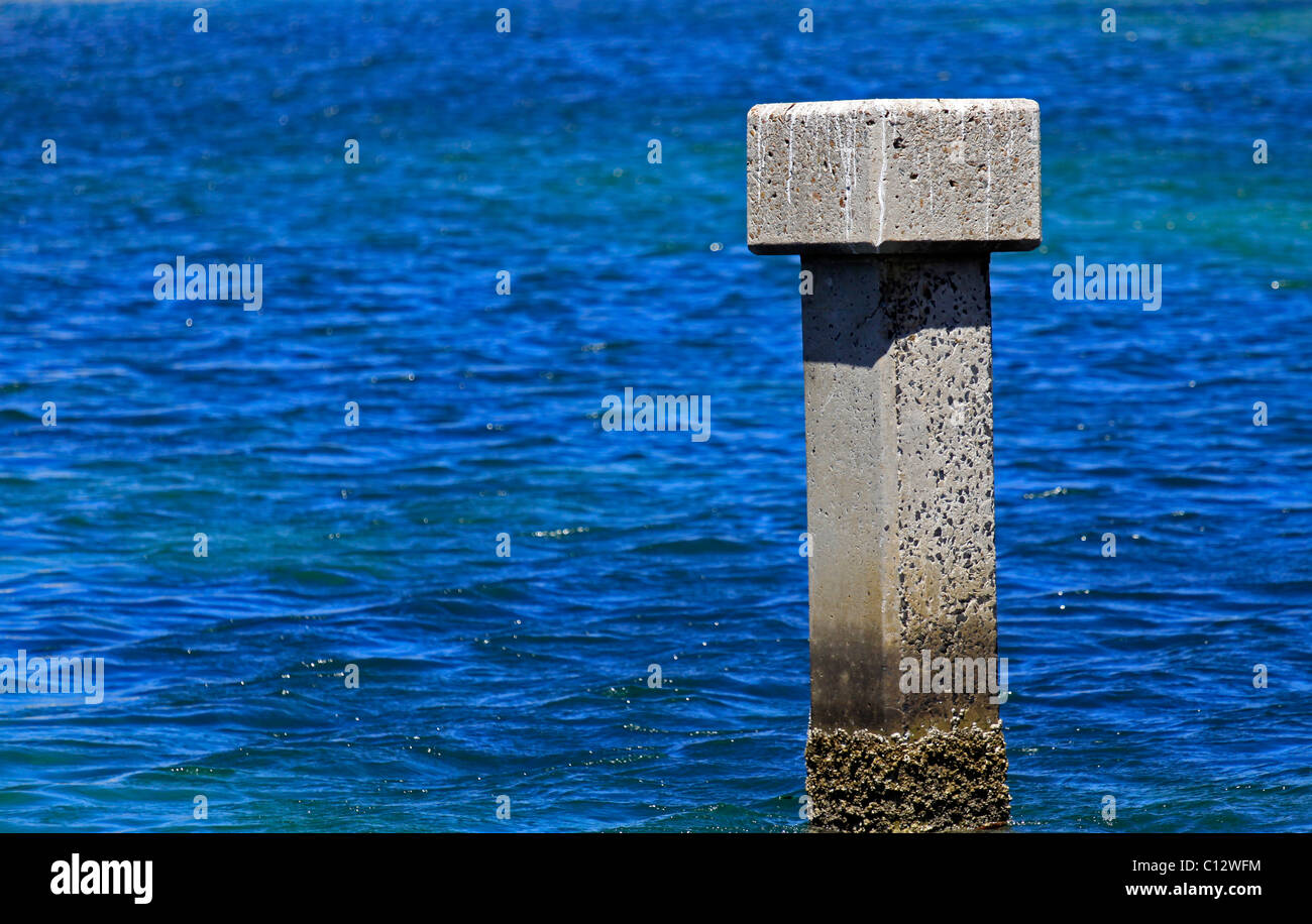Concrete mooring post in Hout Bay Harbour near Cape Town, South Africa ...