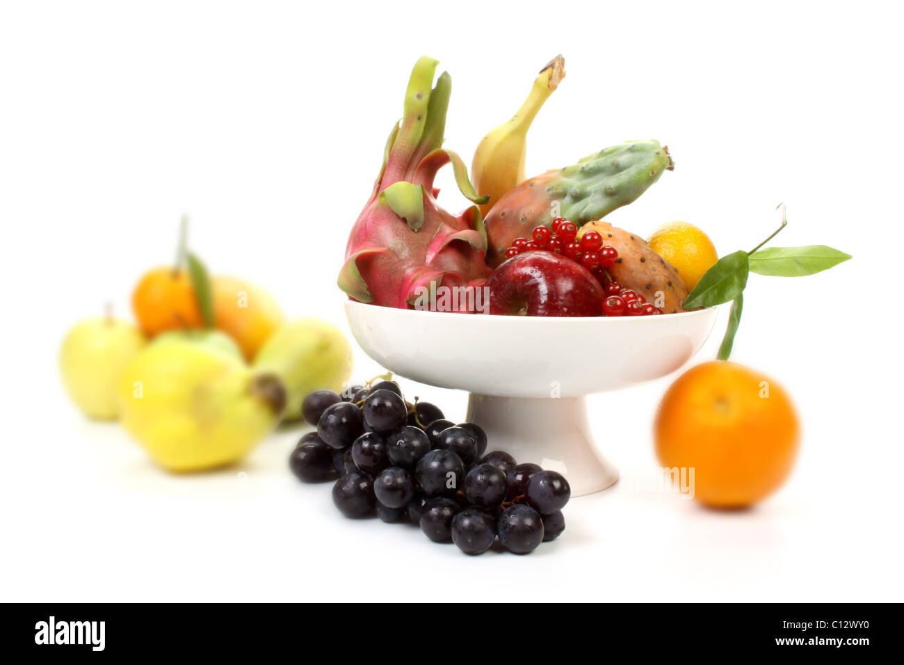 Composition of several fruits on a fruit-dish Stock Photo - Alamy