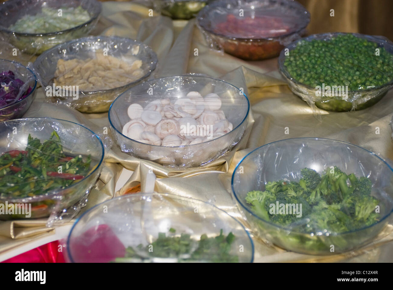 Assorted food served on a table in a wedding Stock Photo - Alamy