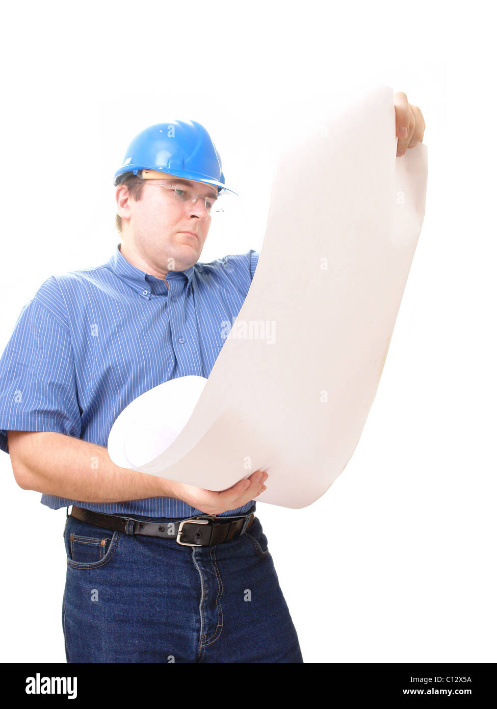 Civil engineer wearing blue helmet studying a building plan over white ...