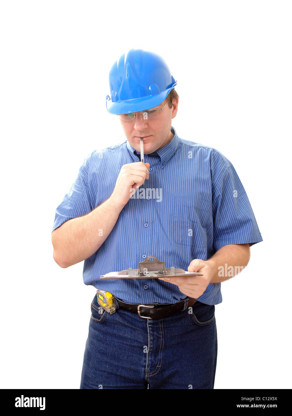 Civil engineer wearing blue helmet with notepad over white Stock Photo ...