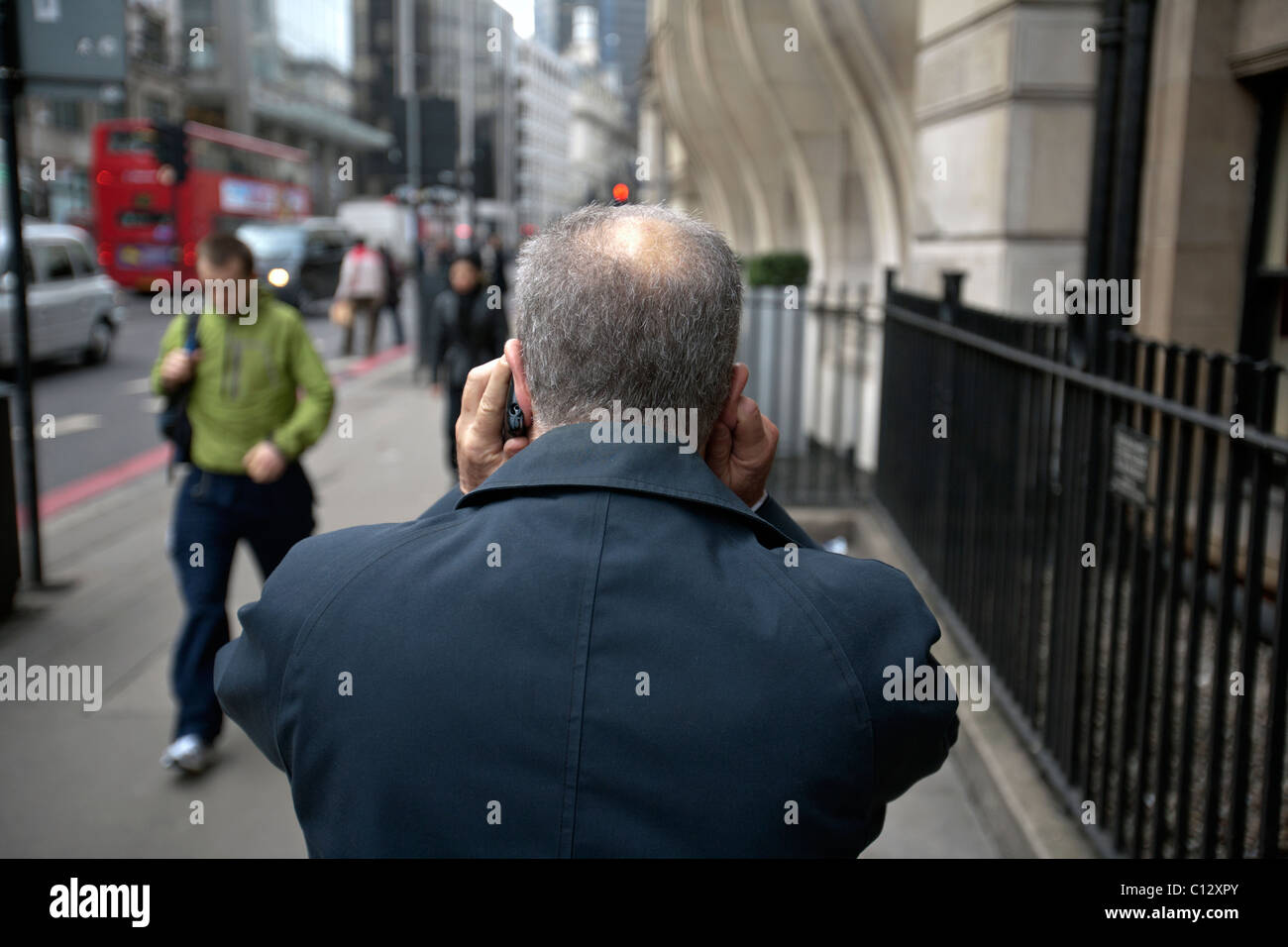 a man on the phone in london Stock Photo - Alamy