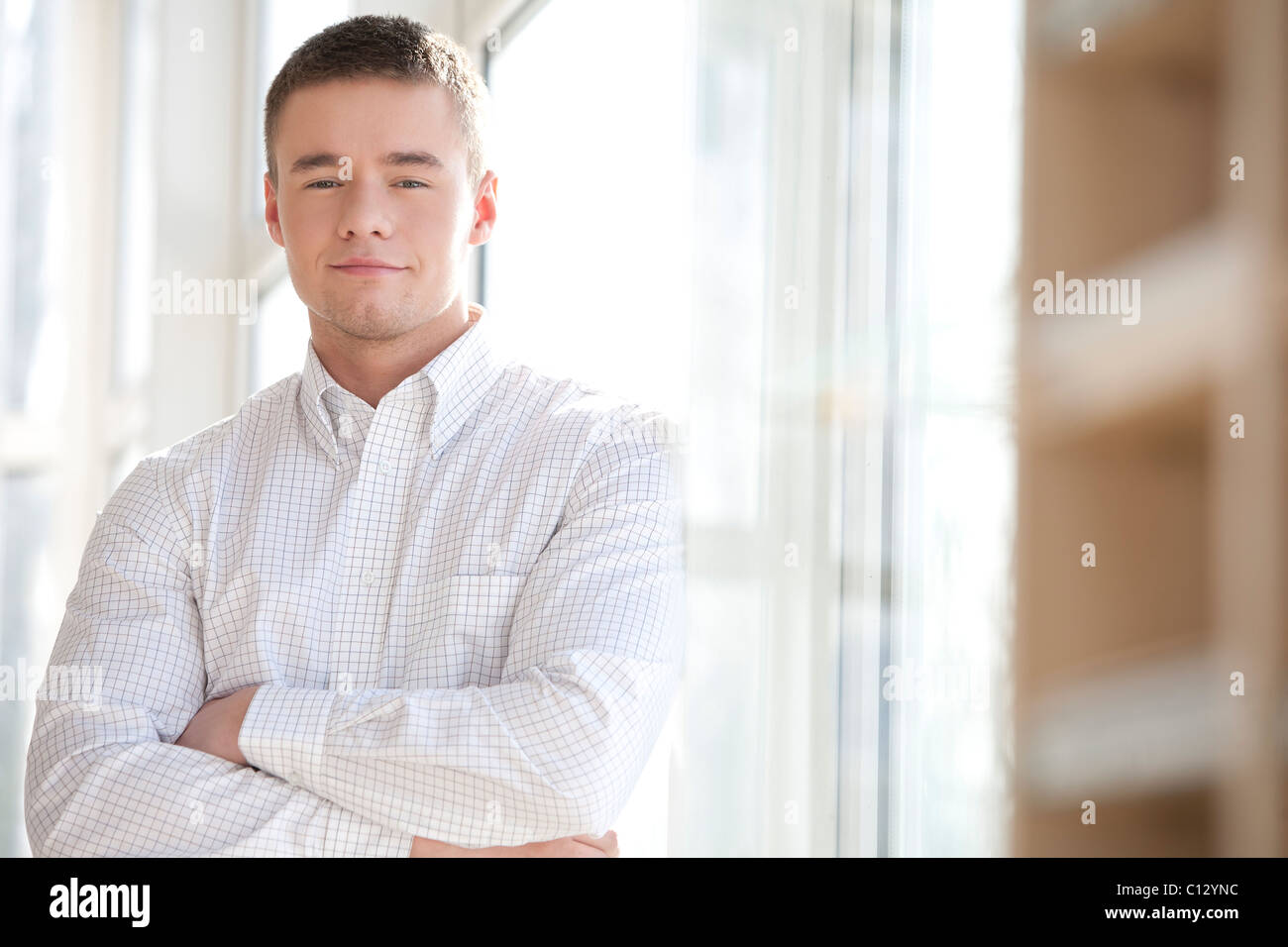 portrait of young businessman Stock Photo - Alamy