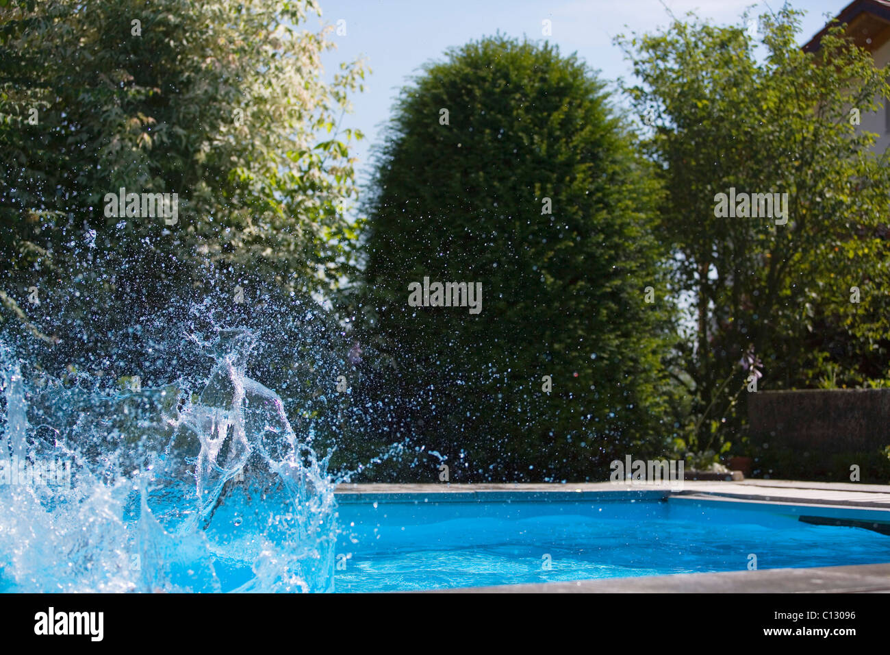 water splashing in swimming pool Stock Photo - Alamy