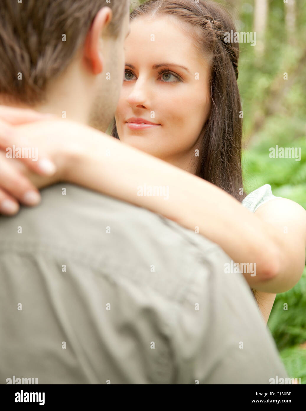 young couple in tender embrace Stock Photo - Alamy