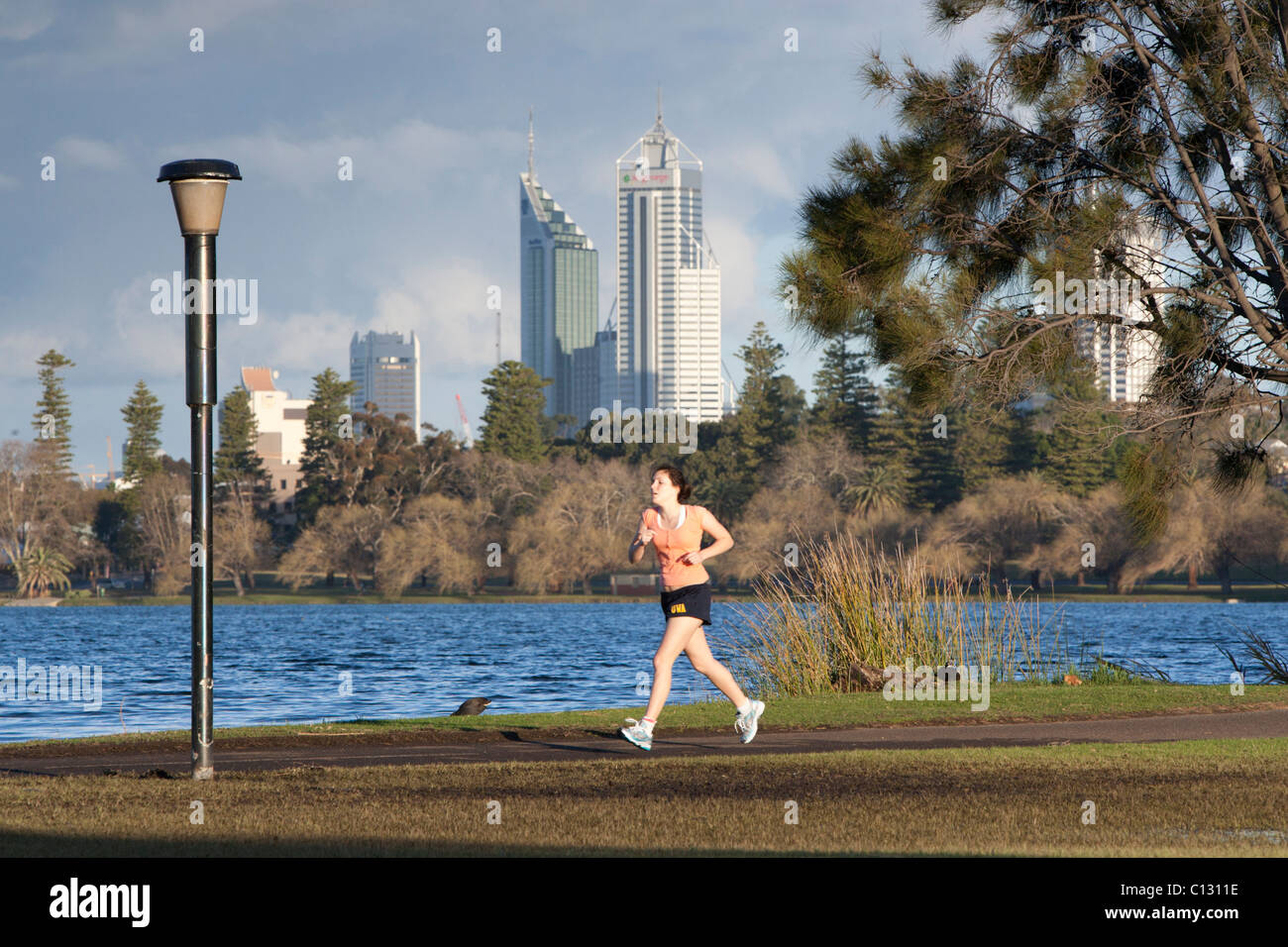 People jogging skyscrapers hi-res stock photography and images - Alamy