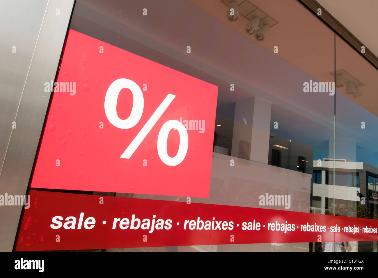 % percentage sale sign in a shop window Stock Photo - Alamy