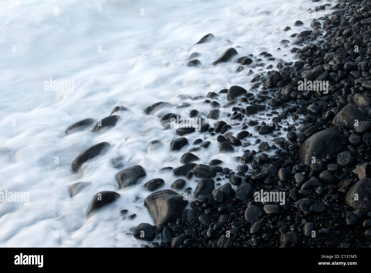 black rocks with waves Stock Photo - Alamy