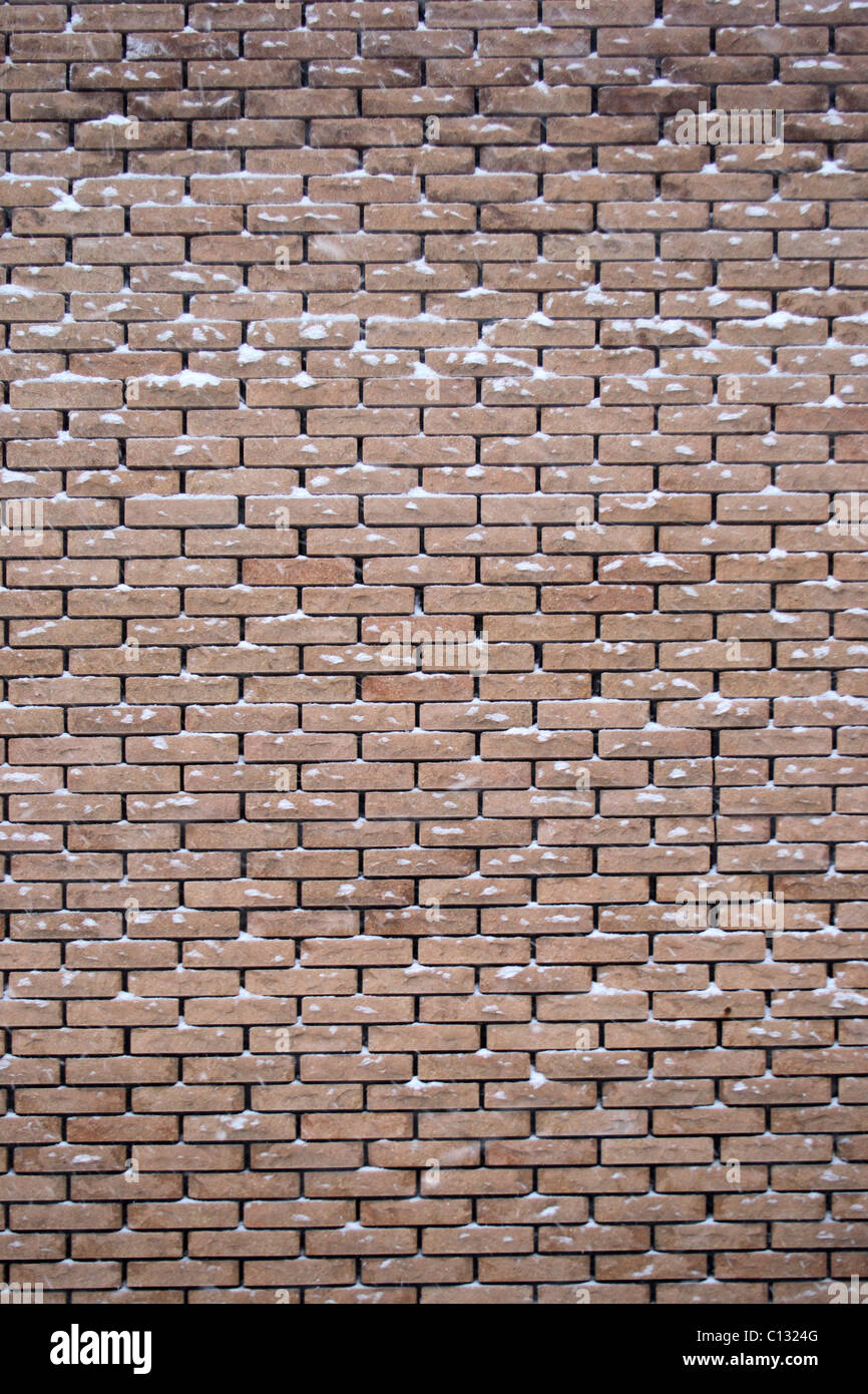 brick wall plastered with snow Stock Photo - Alamy