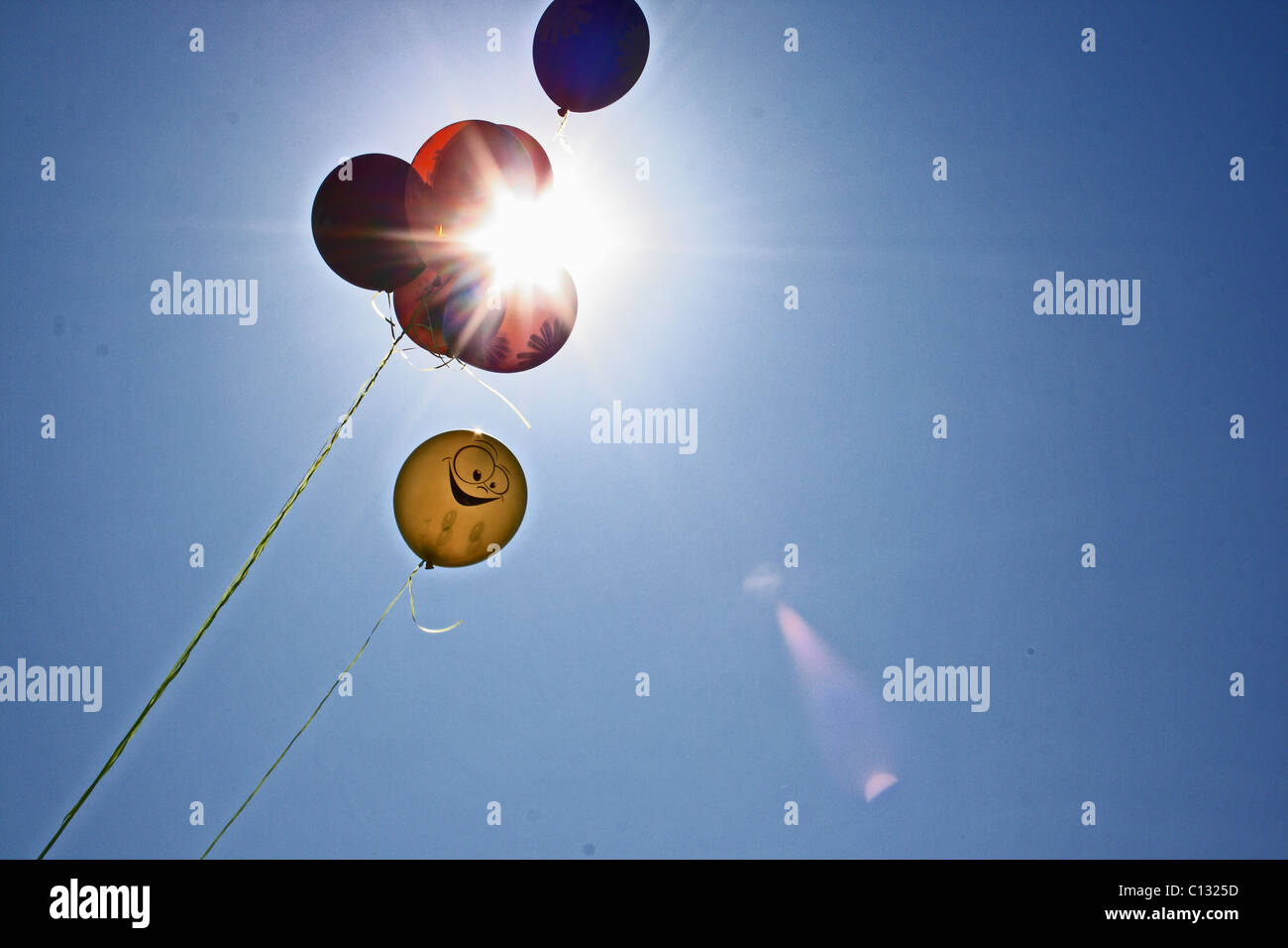 Coloured balloons hi-res stock photography and images - Alamy