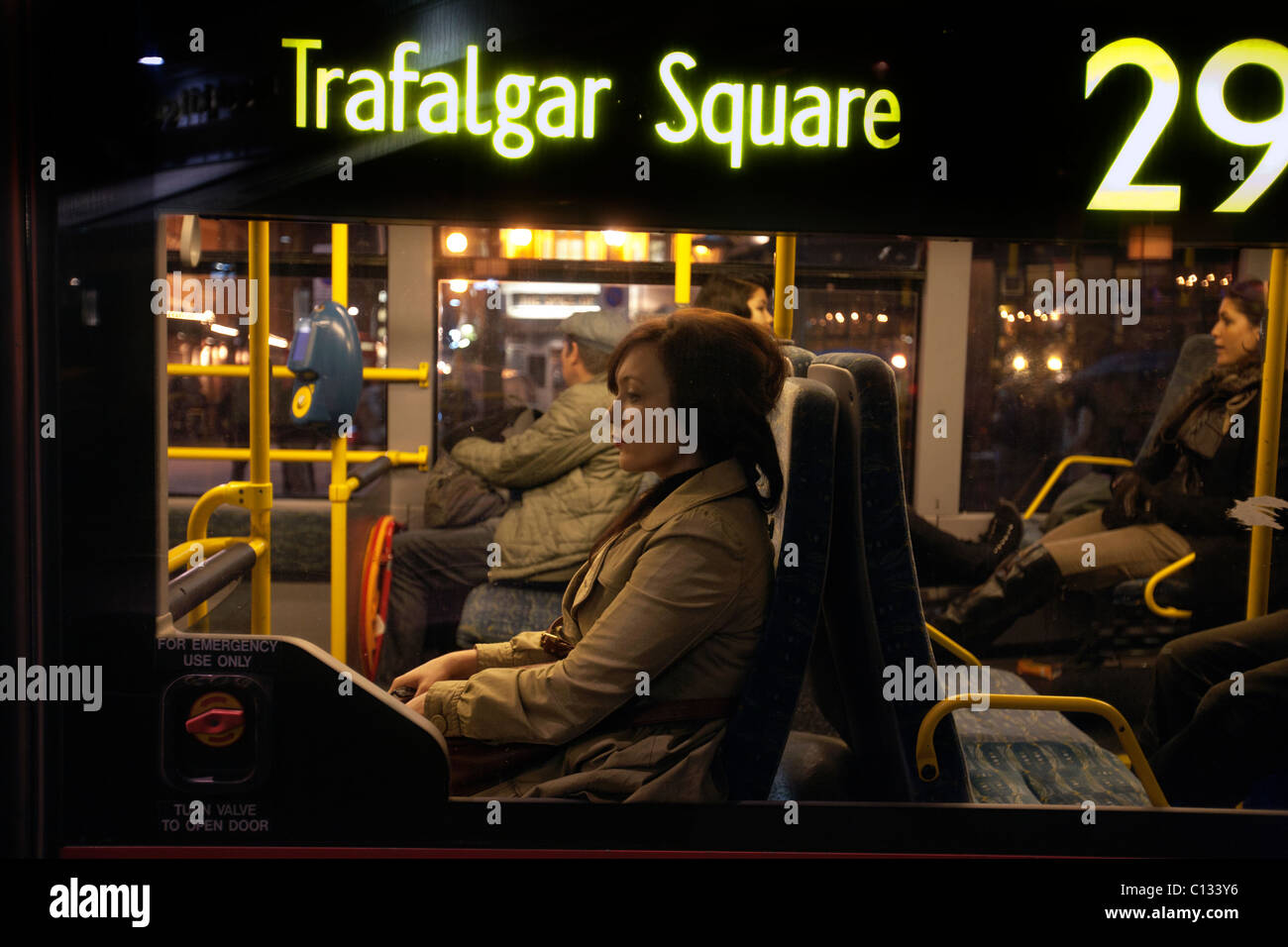 a woman on a london bus Stock Photo - Alamy