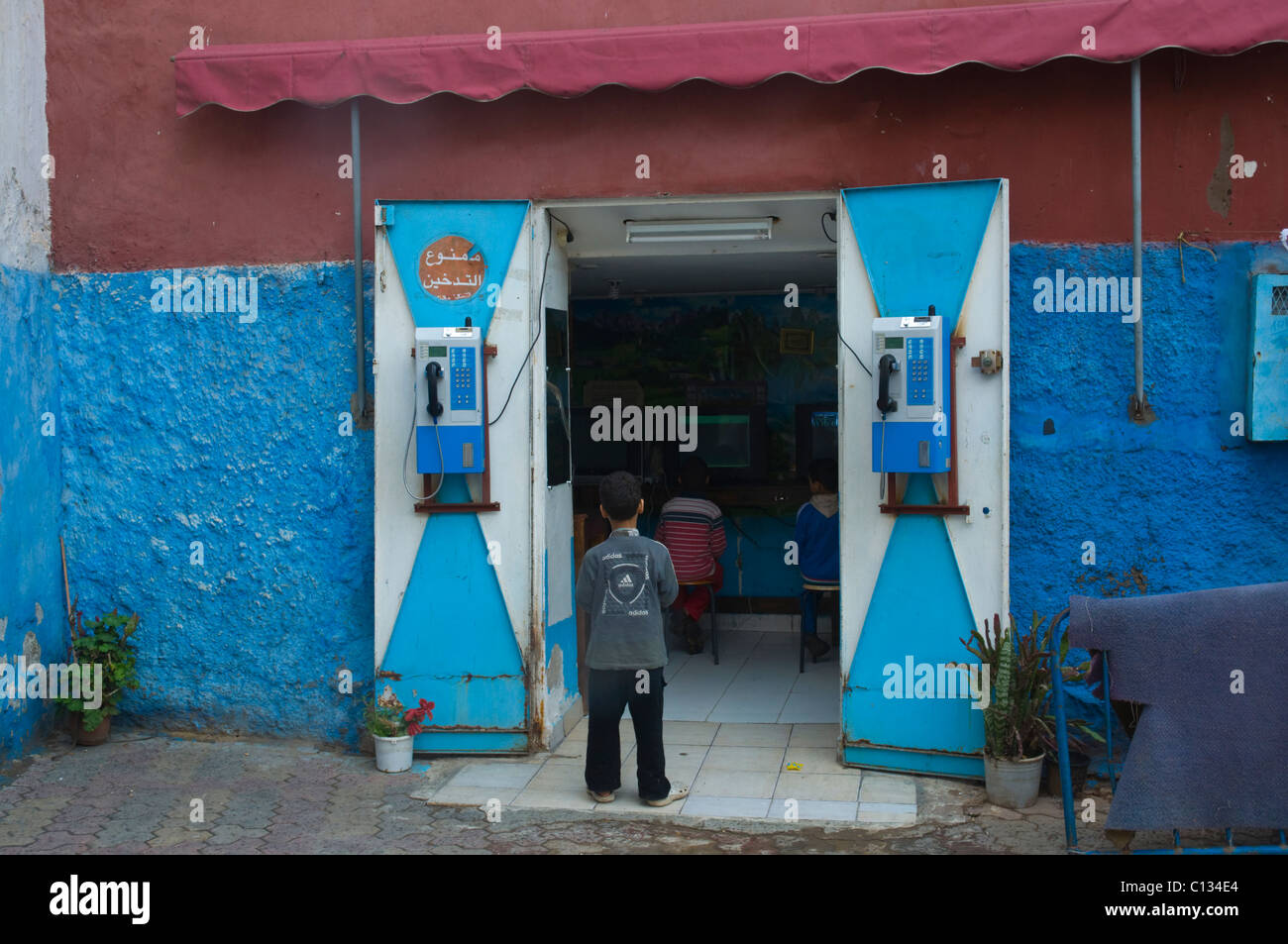 Boy outside game arcade Medina old quarter Casablanca central Morocco ...