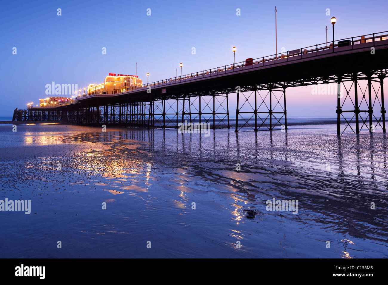 Worthing Pier illuminated at dusk3 Stock Photo - Alamy