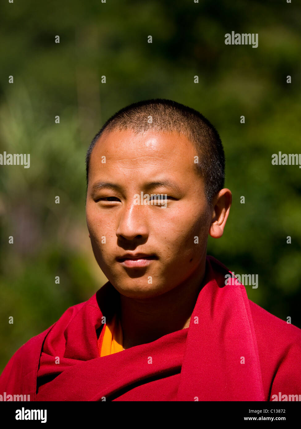 Buddhist monk posing near the Rumtek Monastery Stock Photo - Alamy