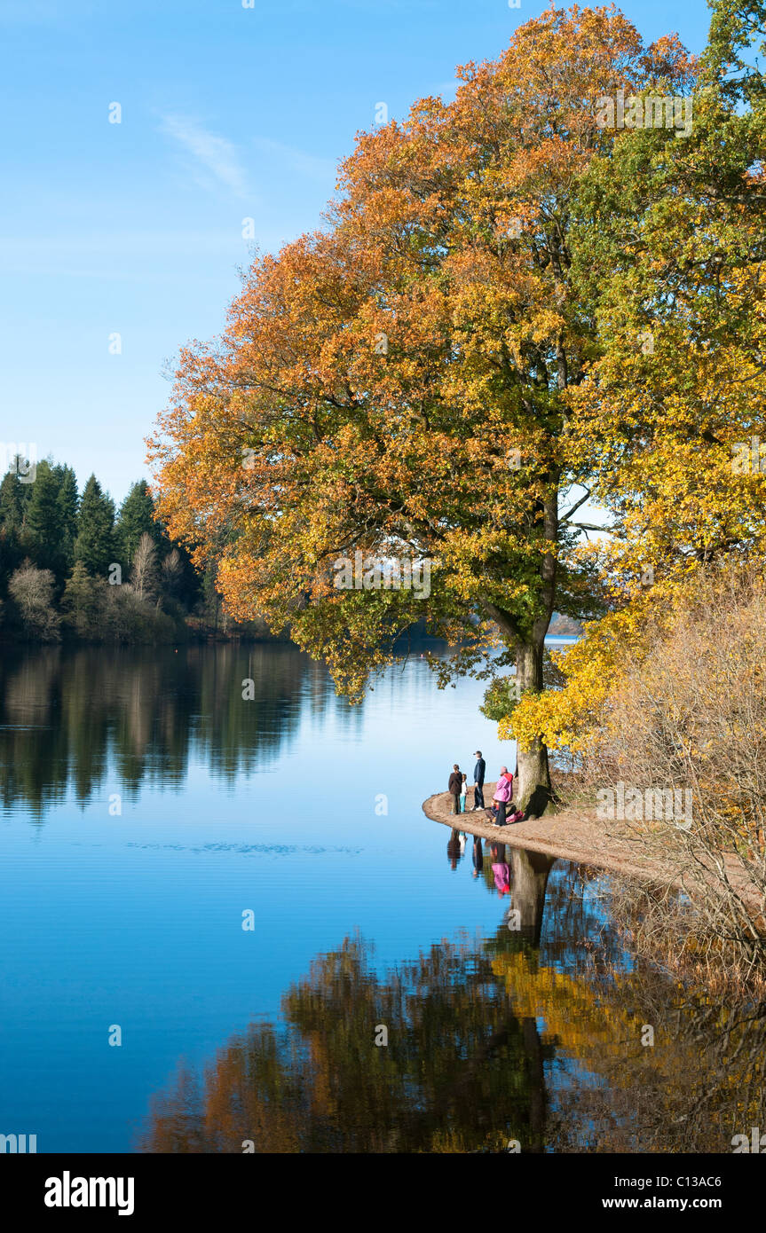Family relaxing on shores of Loch Ken, Galloway Stock Photo - Alamy