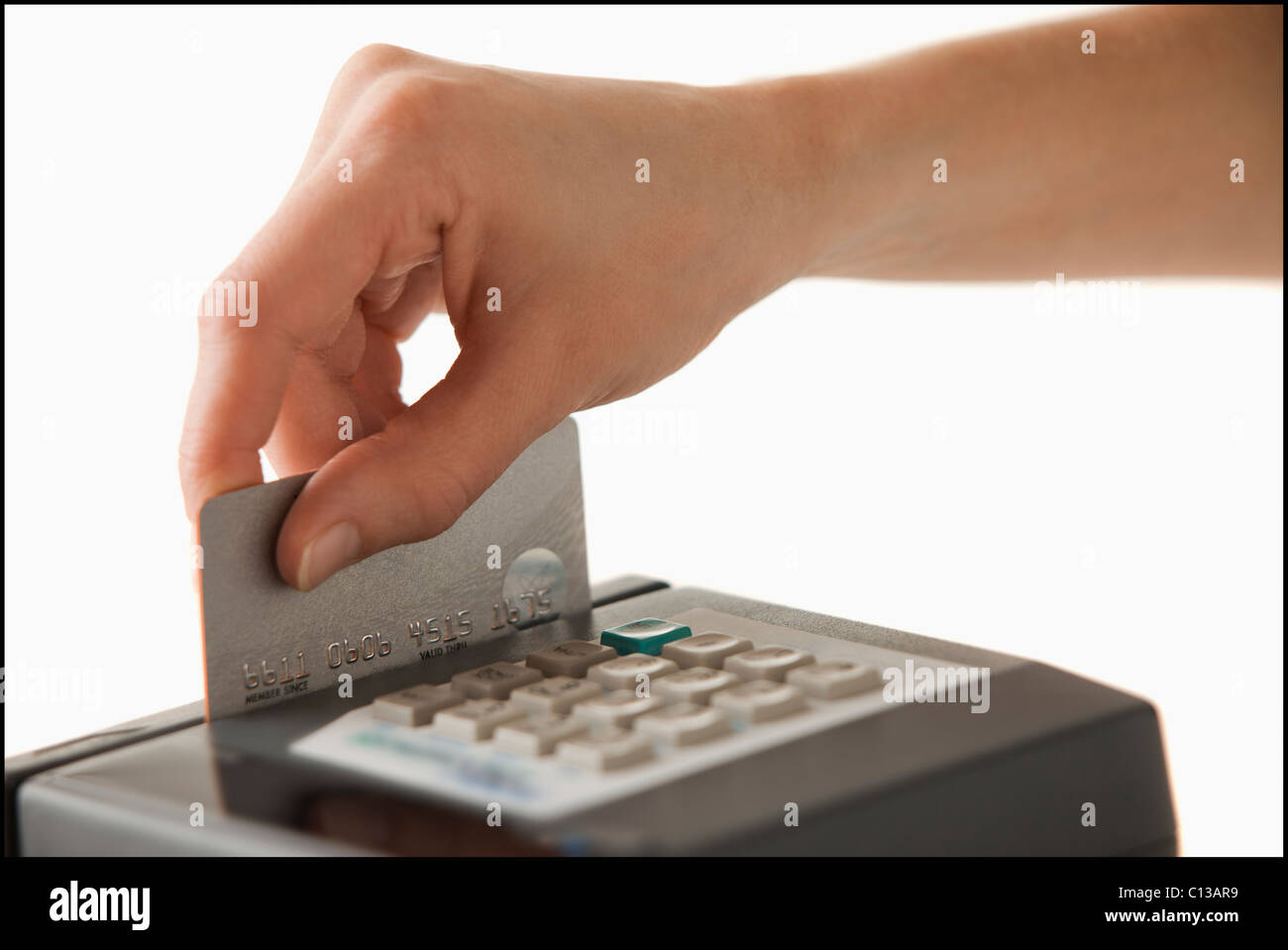 Studio shot of hand using credit card Stock Photo - Alamy