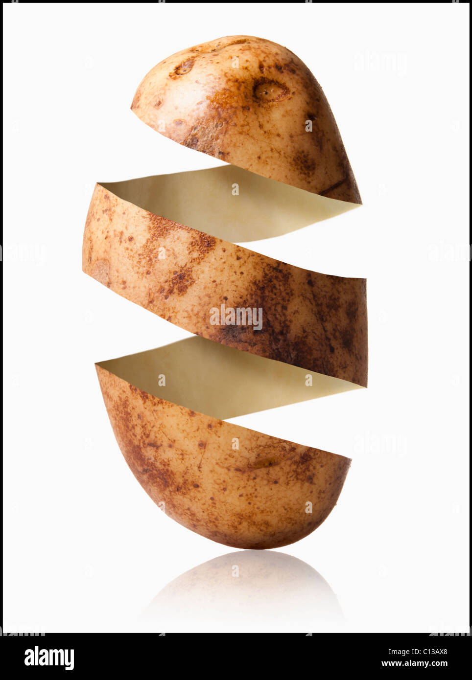 Potato peel in potato shape, studio shot Stock Photo - Alamy