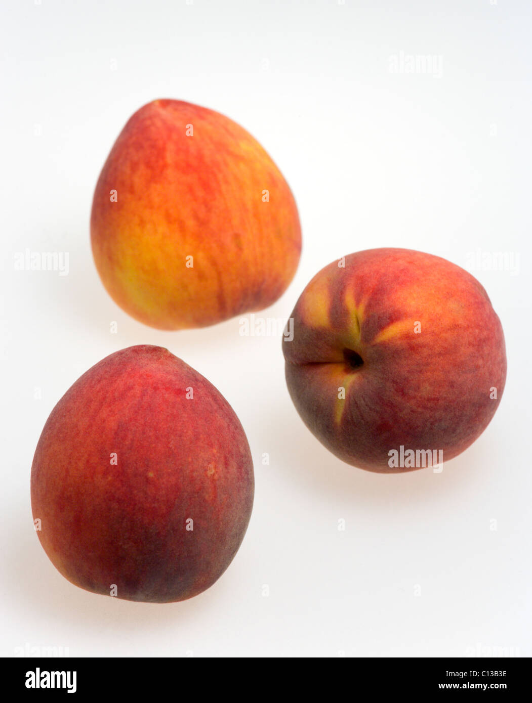 Food, Fruit, Peach, Three ripe red peaches Prunus persica Stock Photo ...