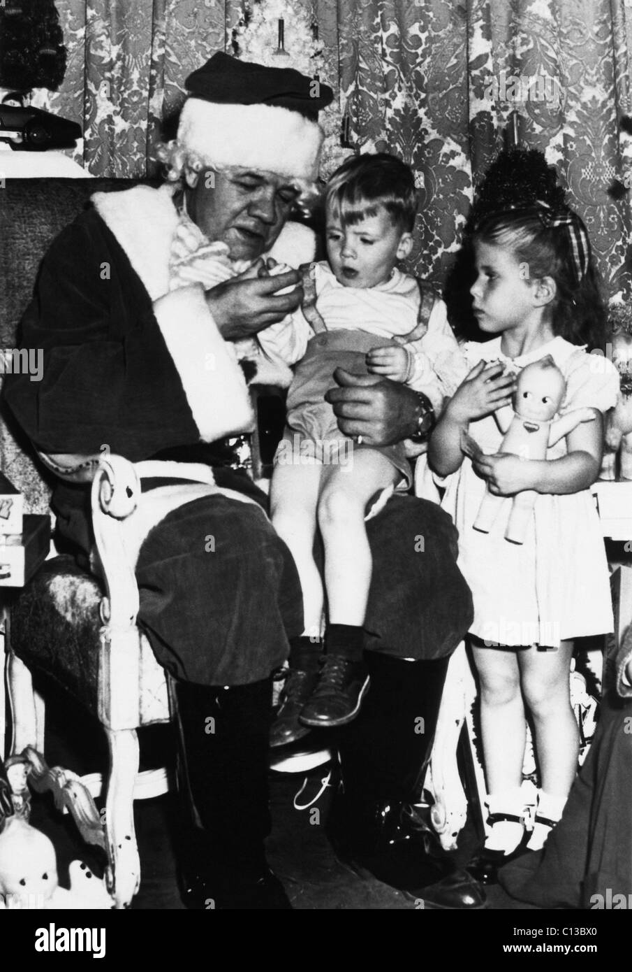 Dressed up as santa Black and White Stock Photos & Images - Alamy