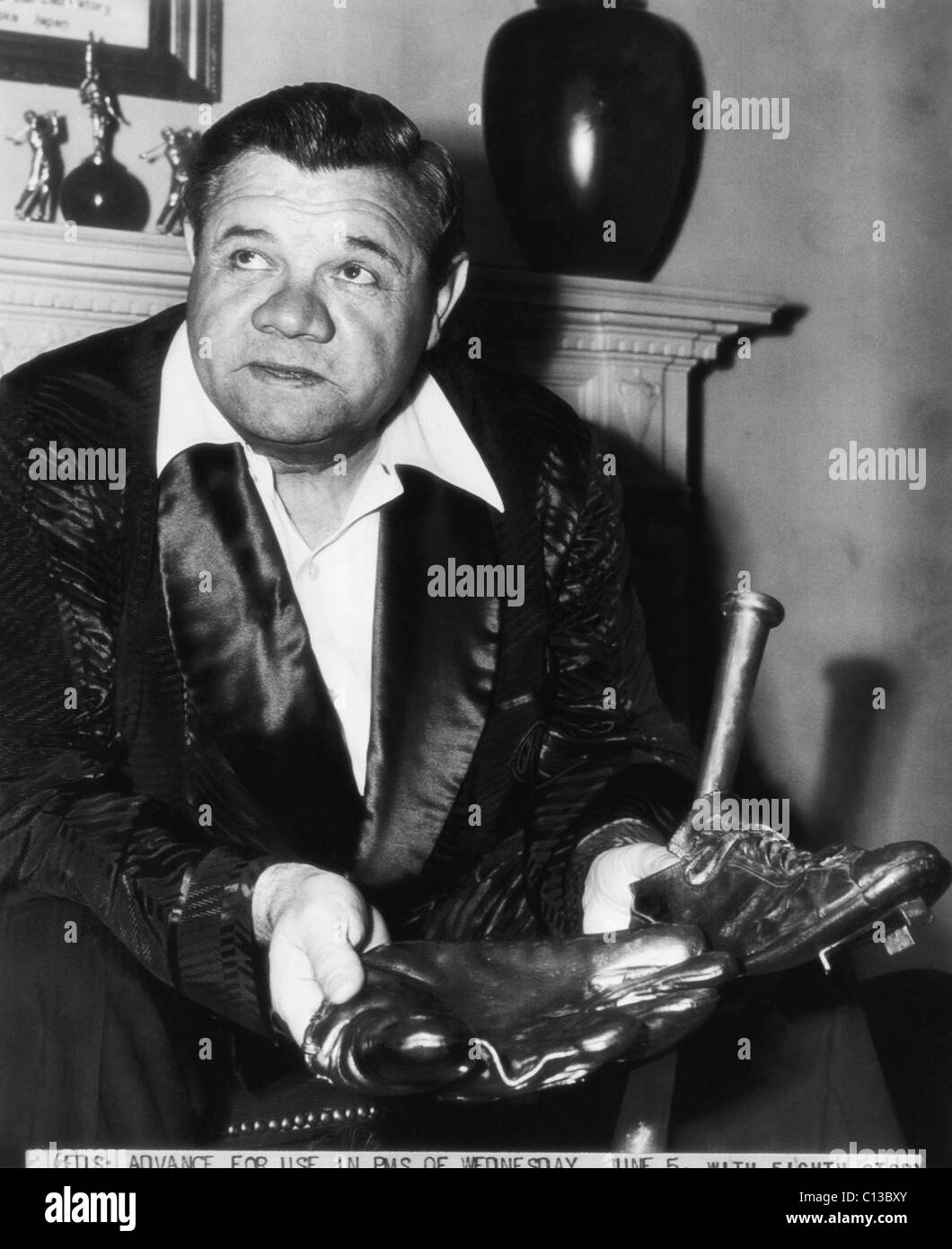 New York Yankees. Retired outfielder Babe Ruth, with bronzed glove ...