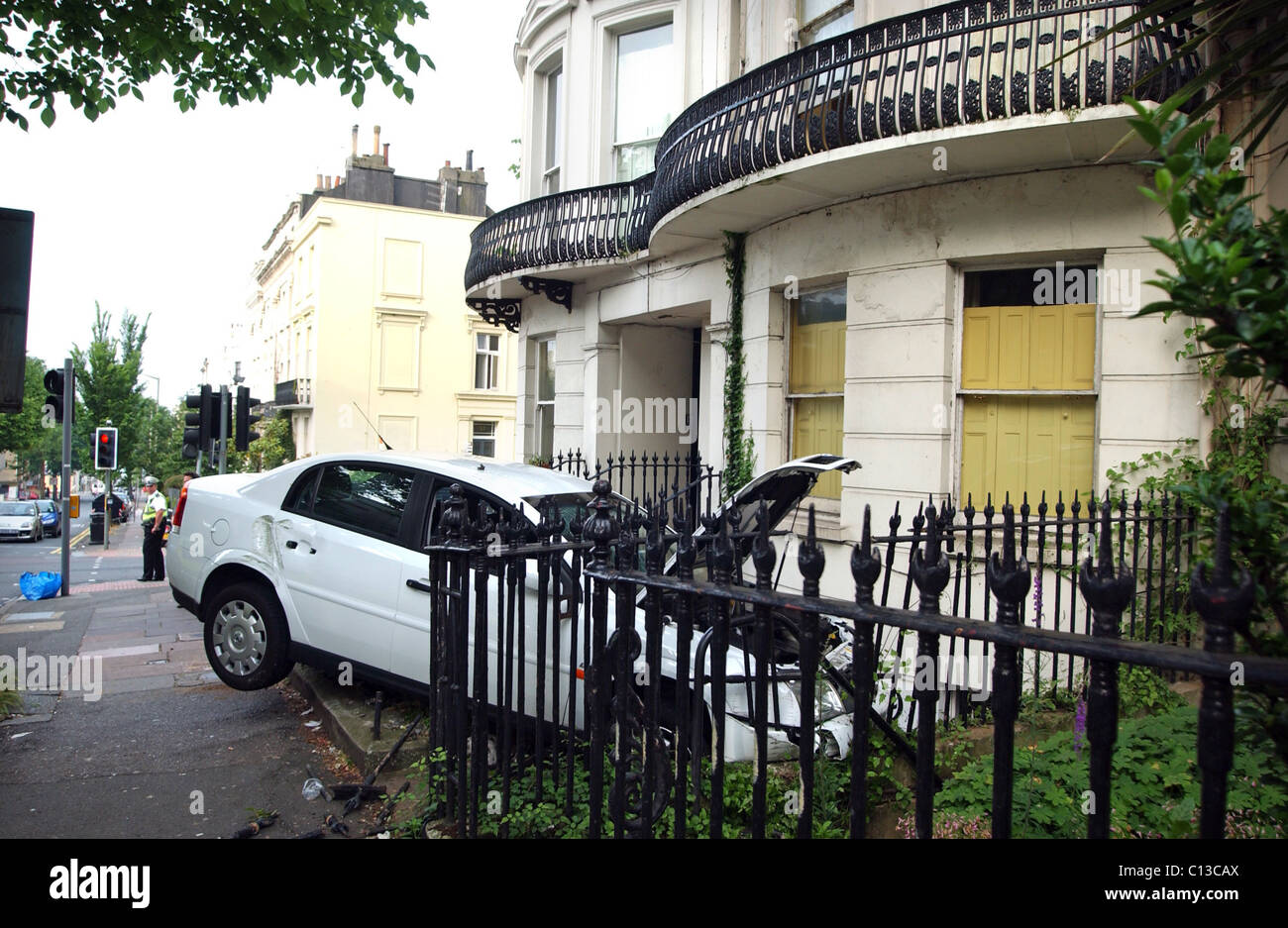 Car crash through fence britain hi-res stock photography and images - Alamy