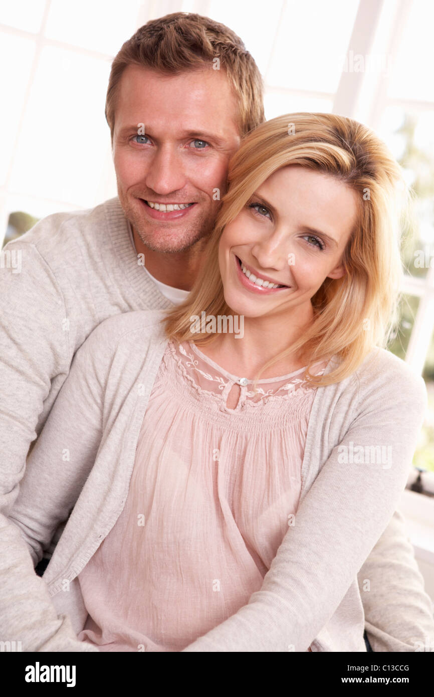 Young couple pose together Stock Photo - Alamy