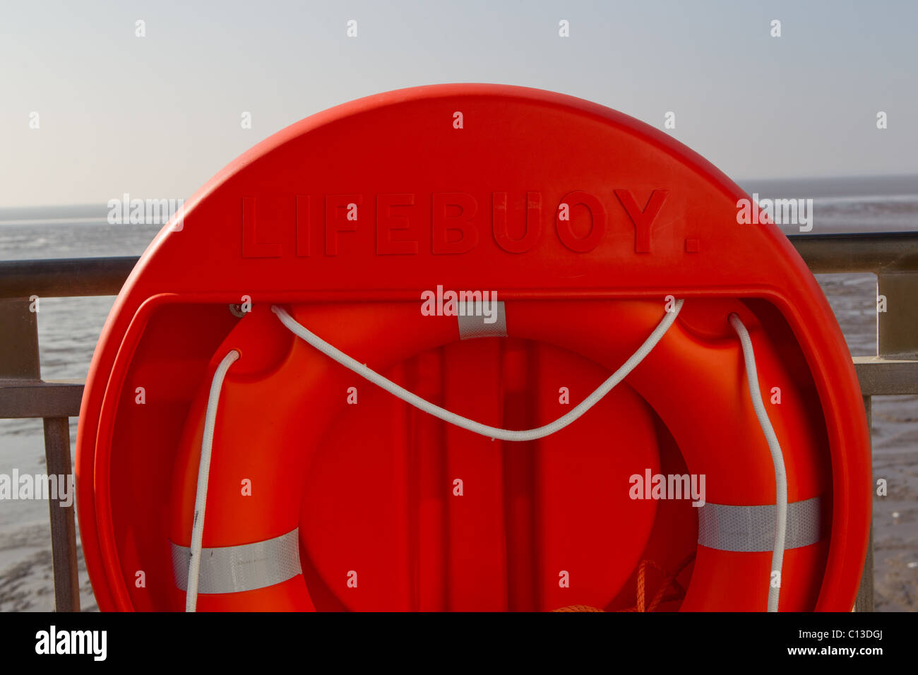 Lifebuoy on a beach Stock Photo - Alamy