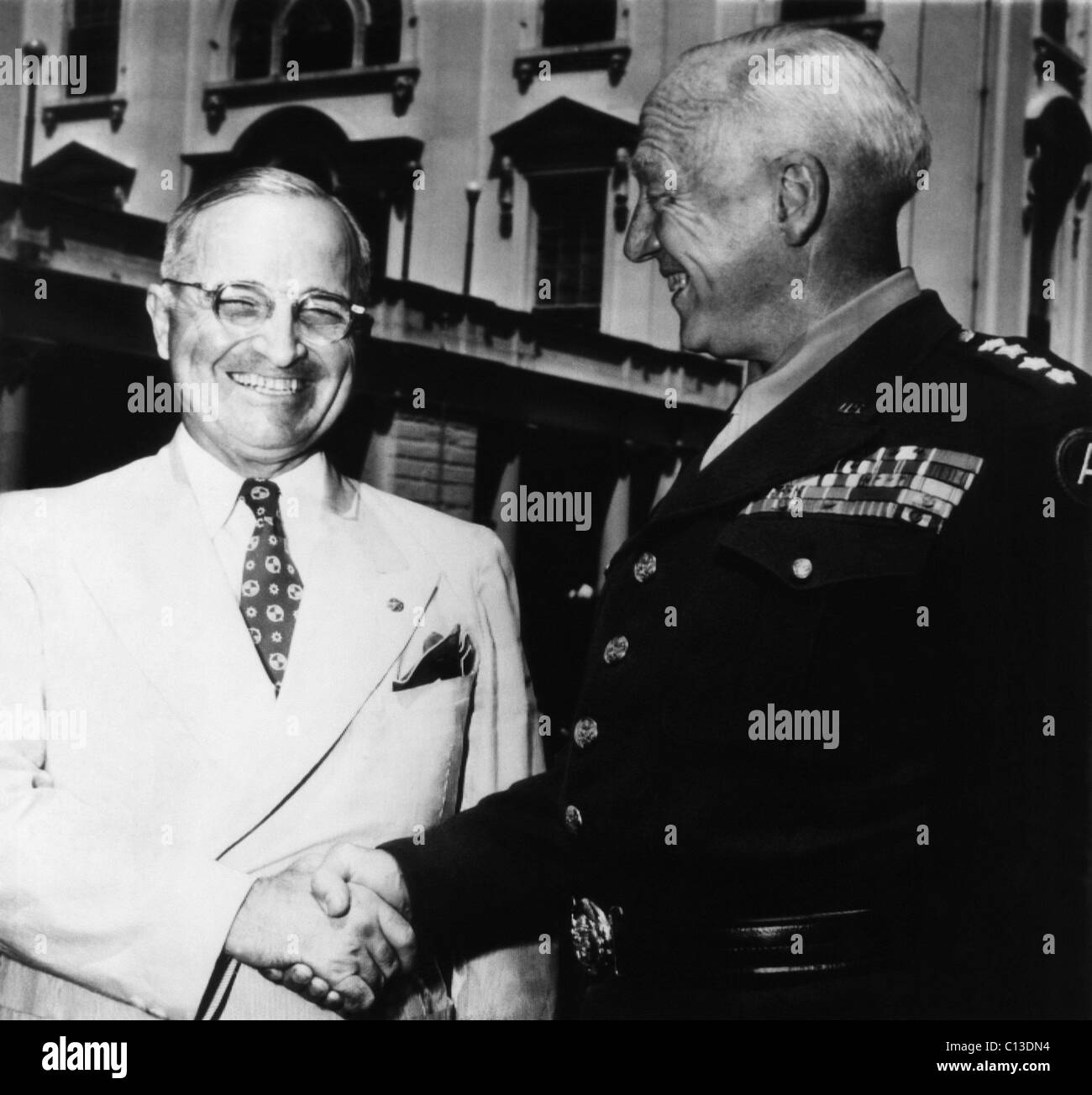 President Harry Truman, shaking hands with General George S. Patton Jr ...