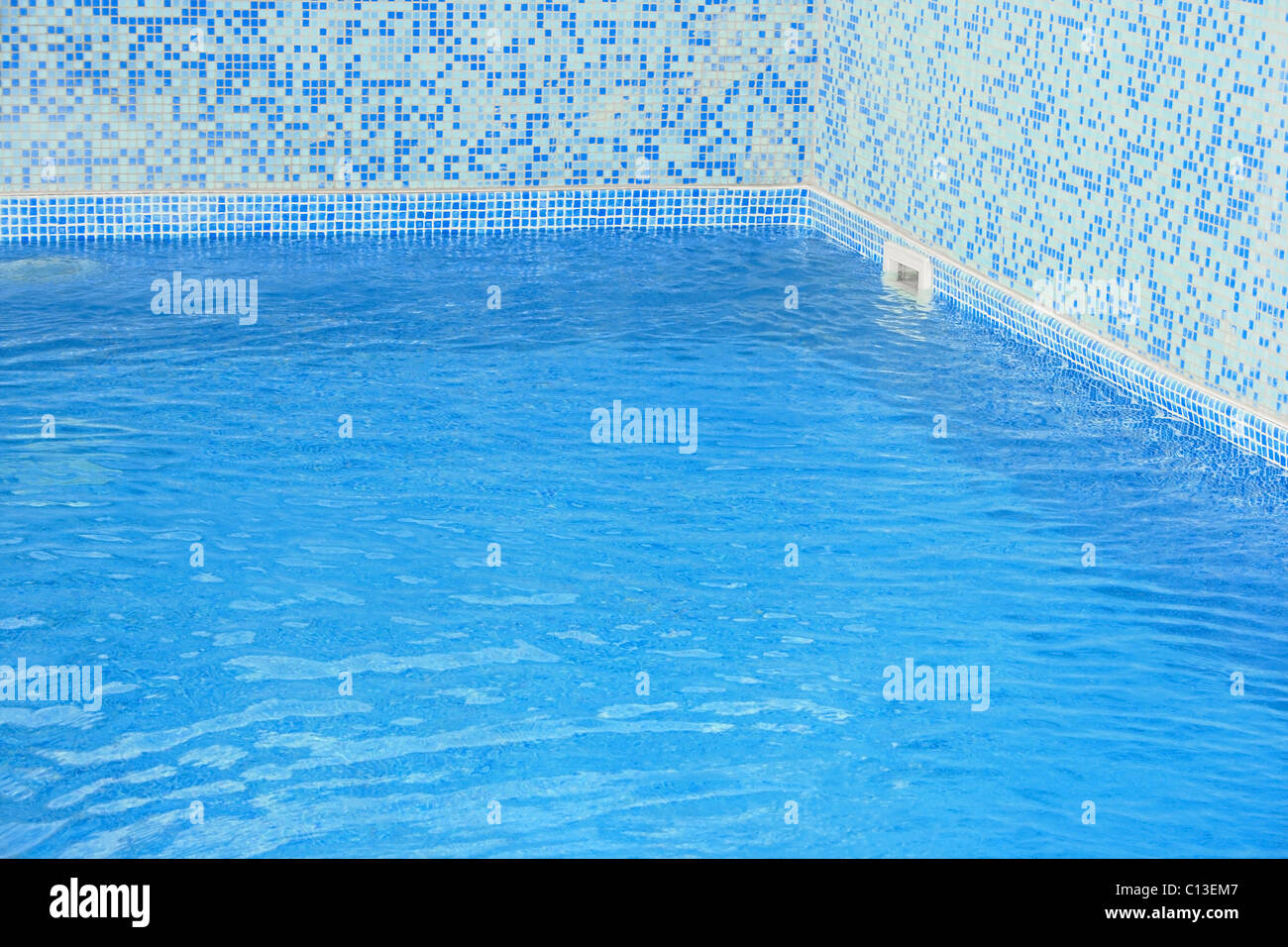 Blue water in swimming pool Stock Photo - Alamy