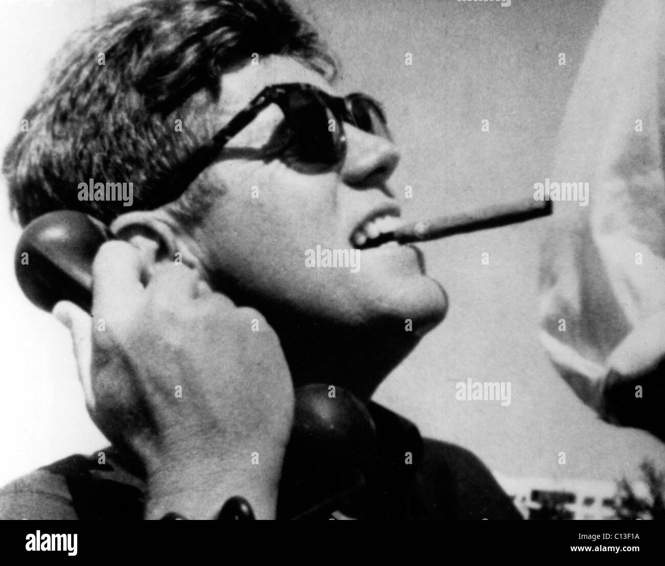 President john kennedy smoking cigar Black and White Stock Photos ...