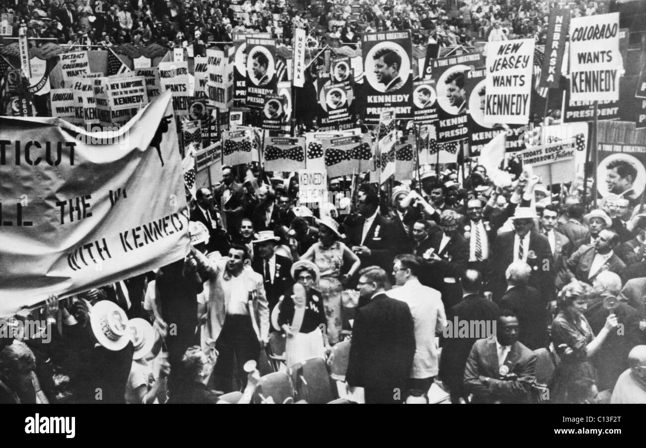Kennedy Presidency. Delegates hoist signs supporting US Senator (and ...