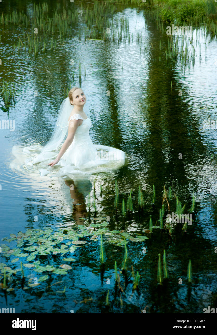 Woman in soaking wet dress hi-res stock photography and images - Alamy