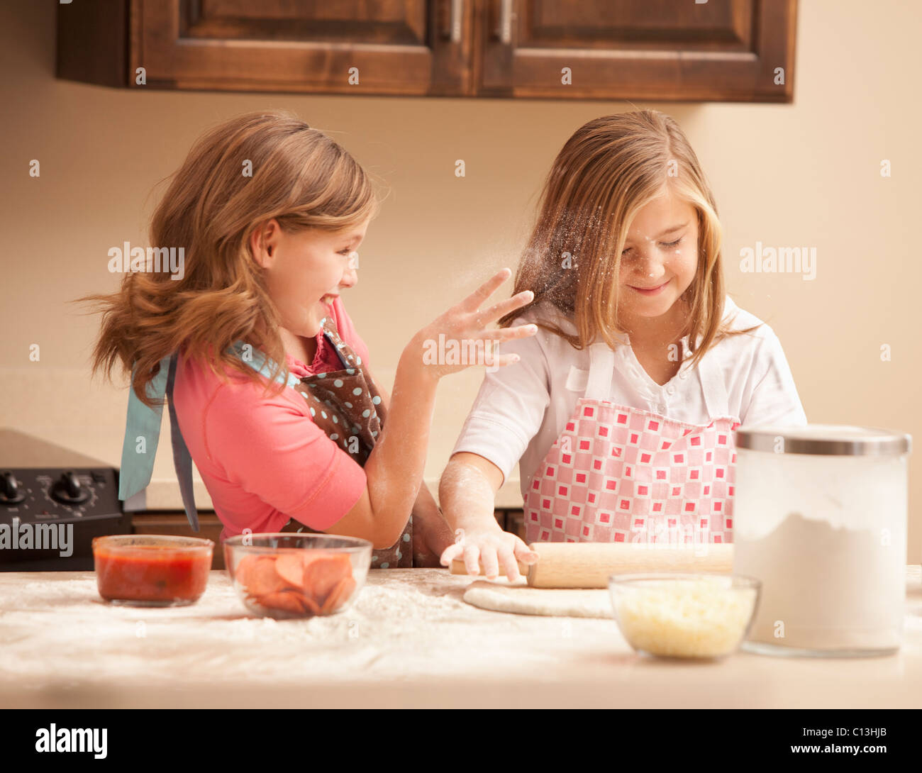 Kids kitchen flour mess hi-res stock photography and images - Alamy