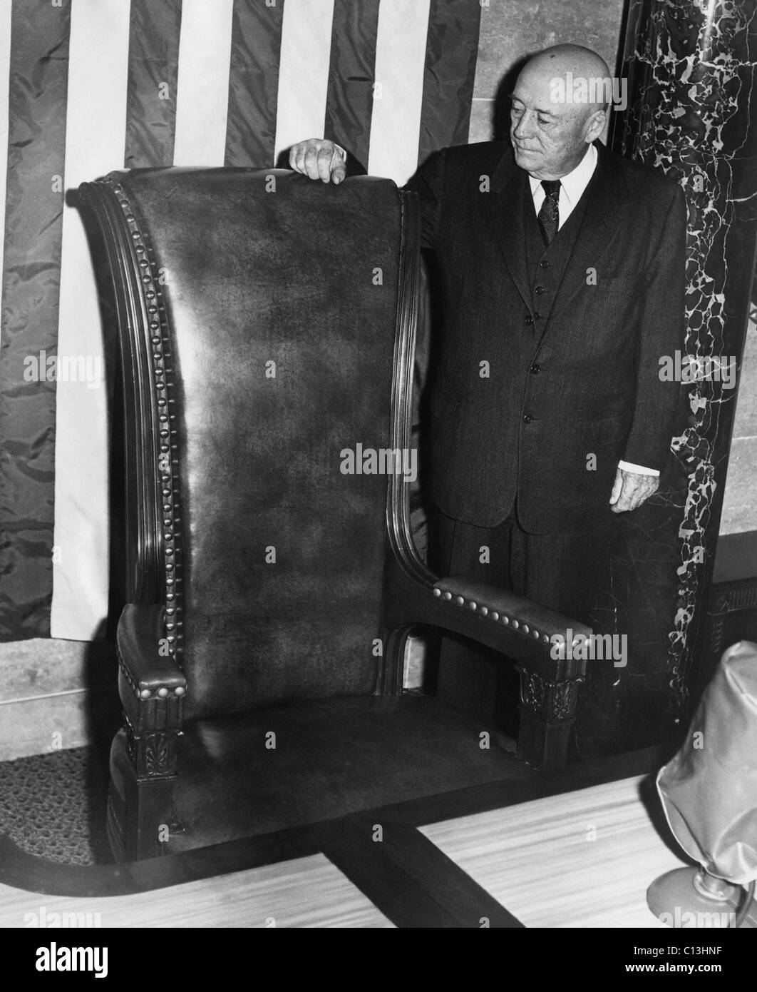 House Speaker Sam Rayburn, looks over his chair, on the rostrum of the ...