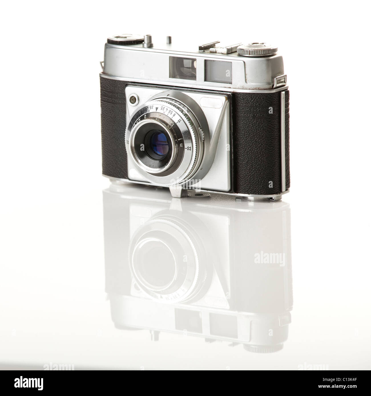 Old fashioned photography camera isolated over a white background Stock ...