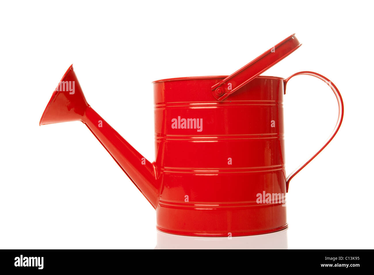 Watering can isolated over a white background Stock Photo - Alamy