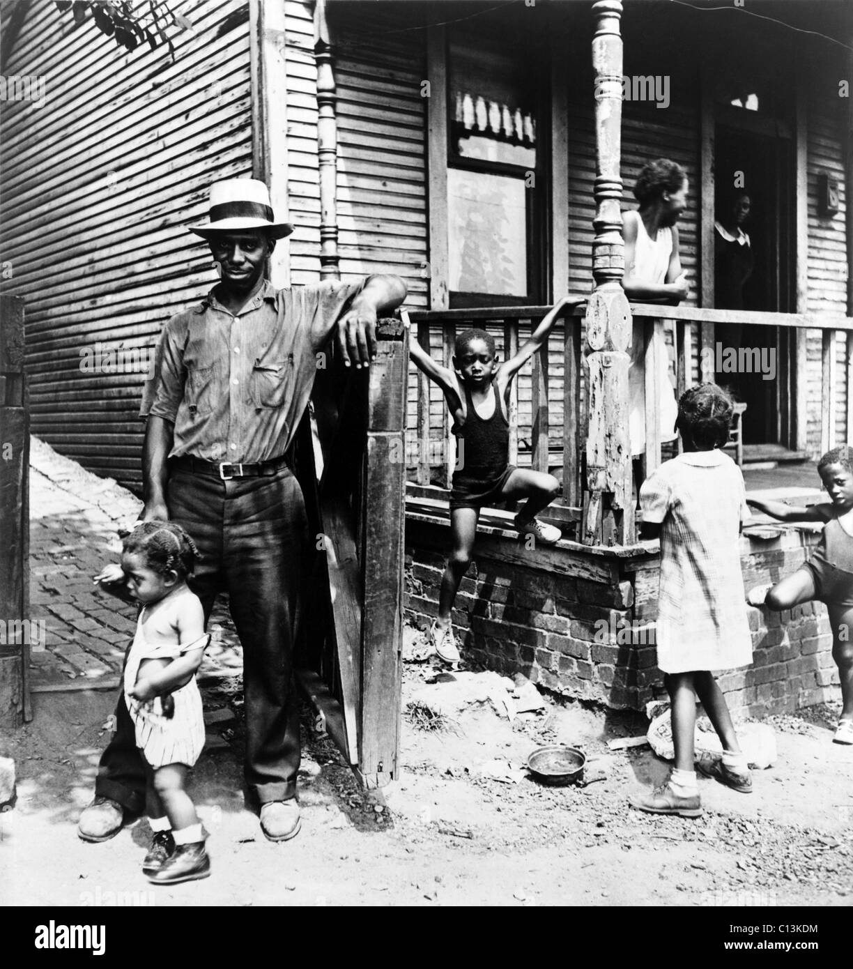 African American steelworker with his family in Pittsburgh ...