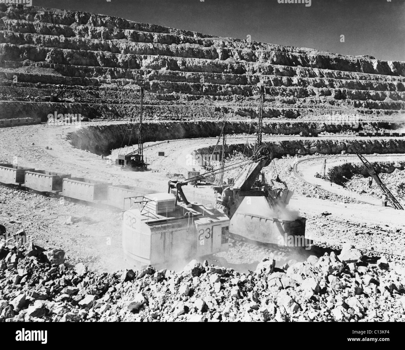 Open pit copper mine at Chuquicamata, Chile. Photo shows a crane steam ...
