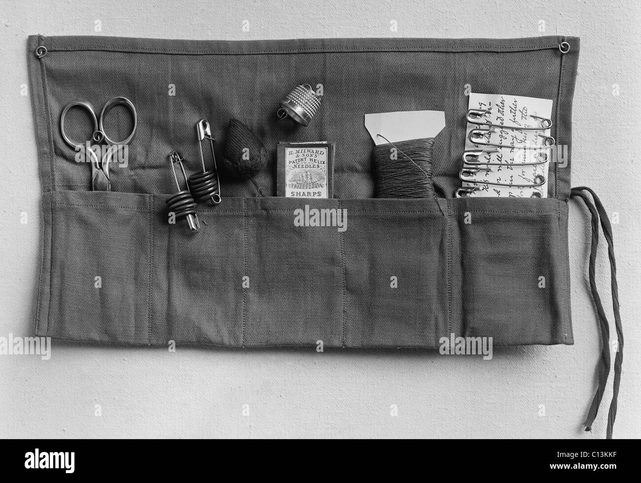 A simple sewing kit, provided to sailors by the Navy League of the U.S ...