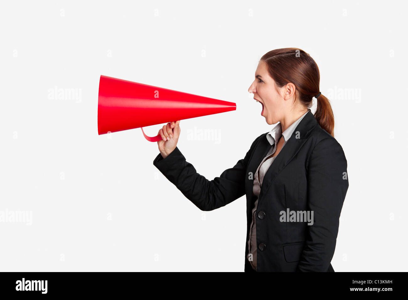 Business young woman speaking to a megaphone, isolated on white Stock ...
