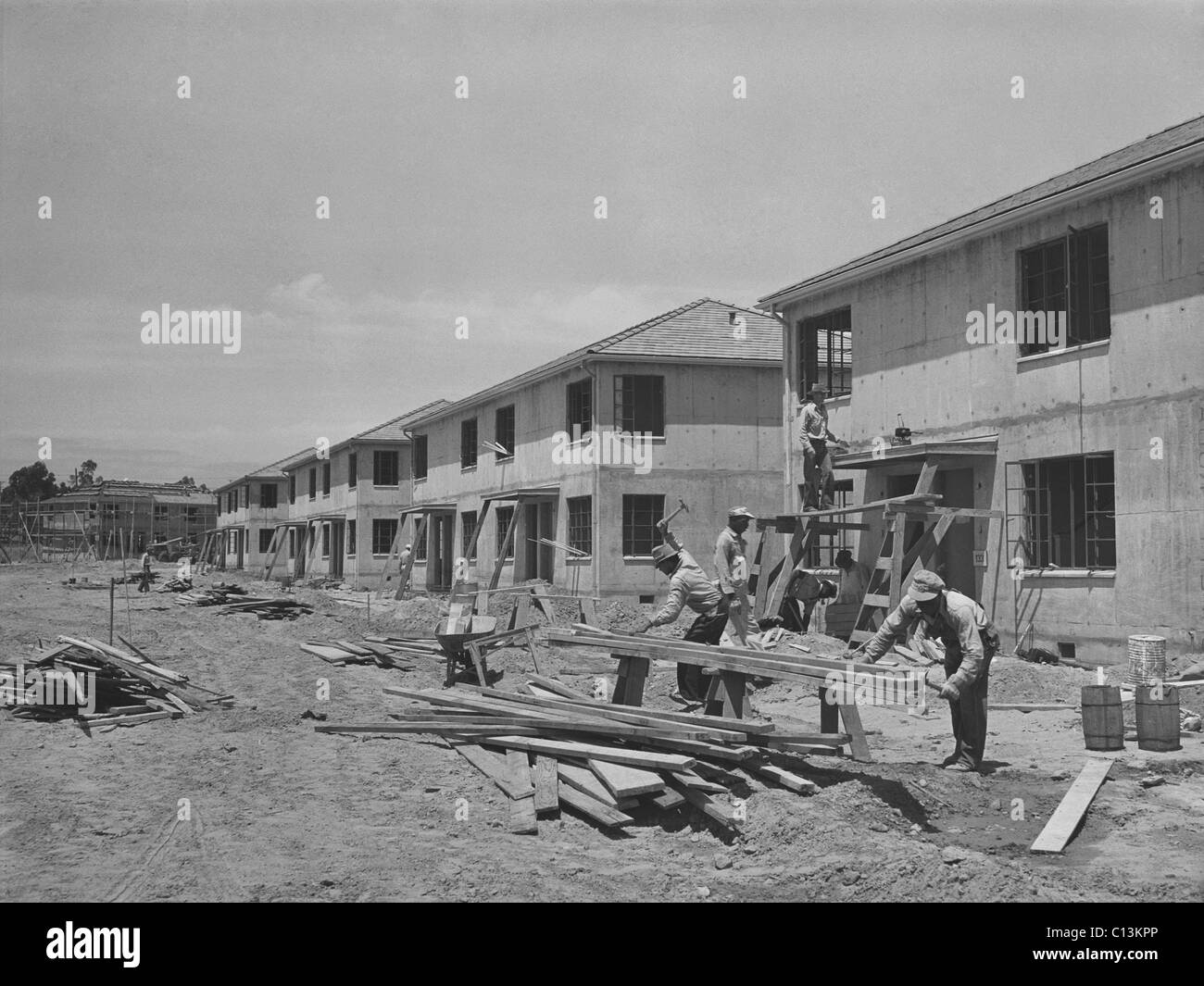 Houses under construction at the Navy defense housing project for ...
