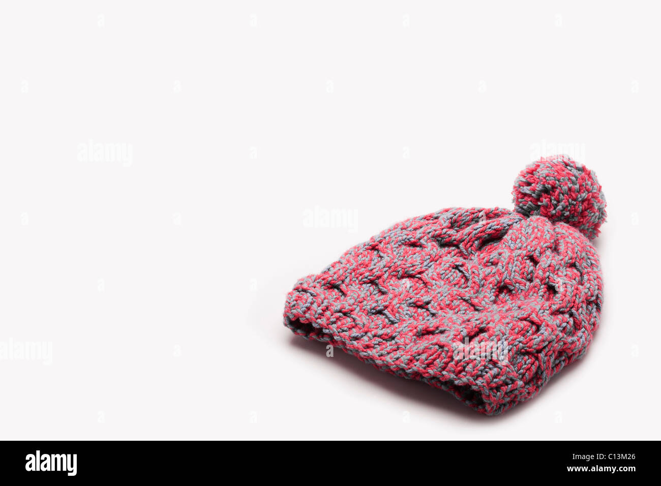 Pink wooly hat Stock Photo - Alamy