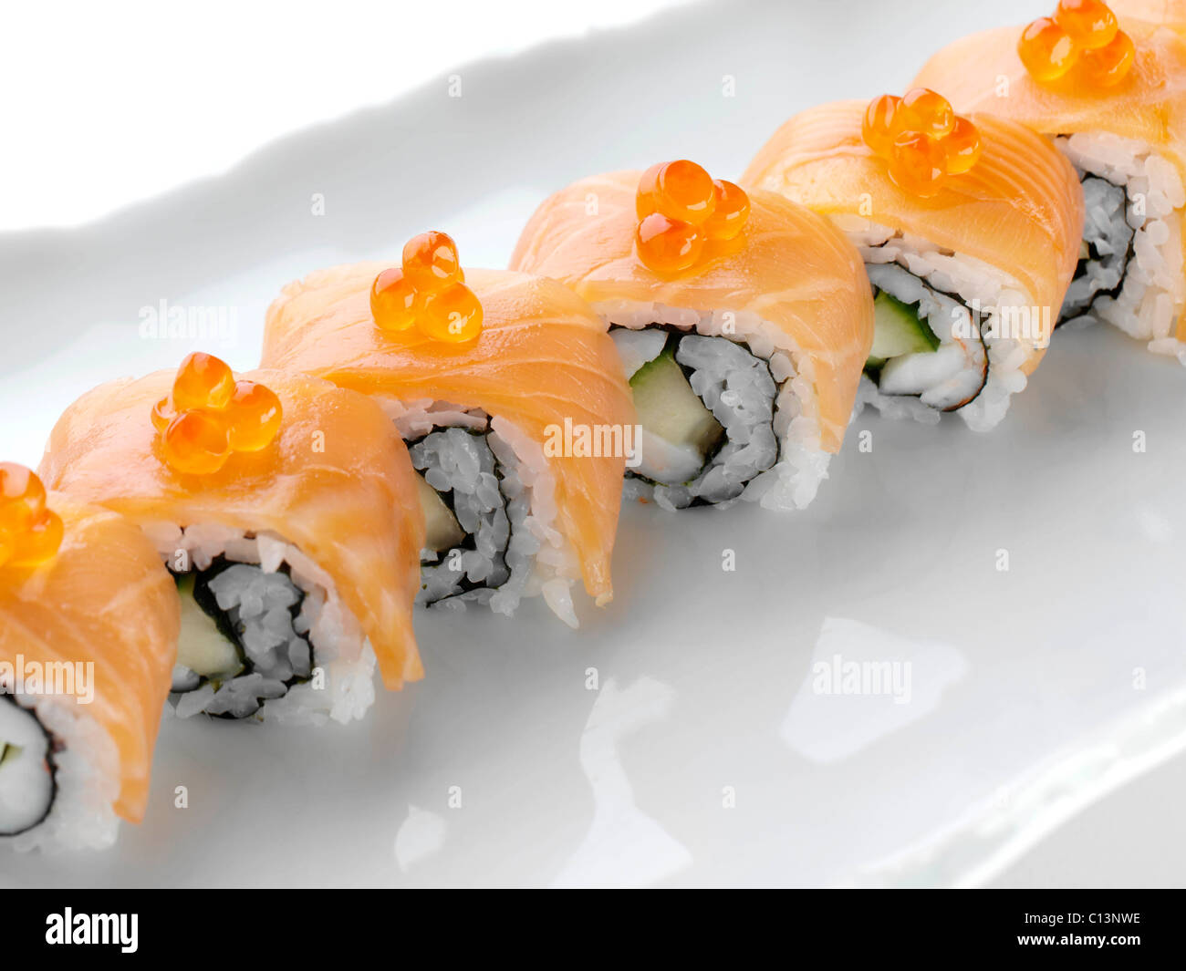Smoked salmon sushi with rice Stock Photo - Alamy