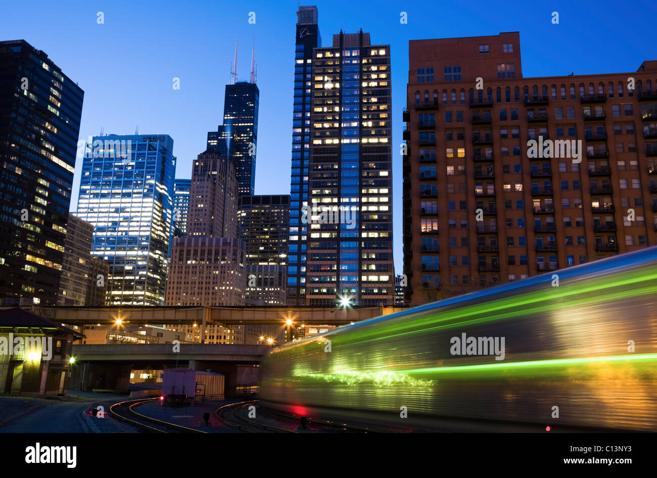 USA, Illinois, Chicago, night cityscape with train Stock Photo - Alamy