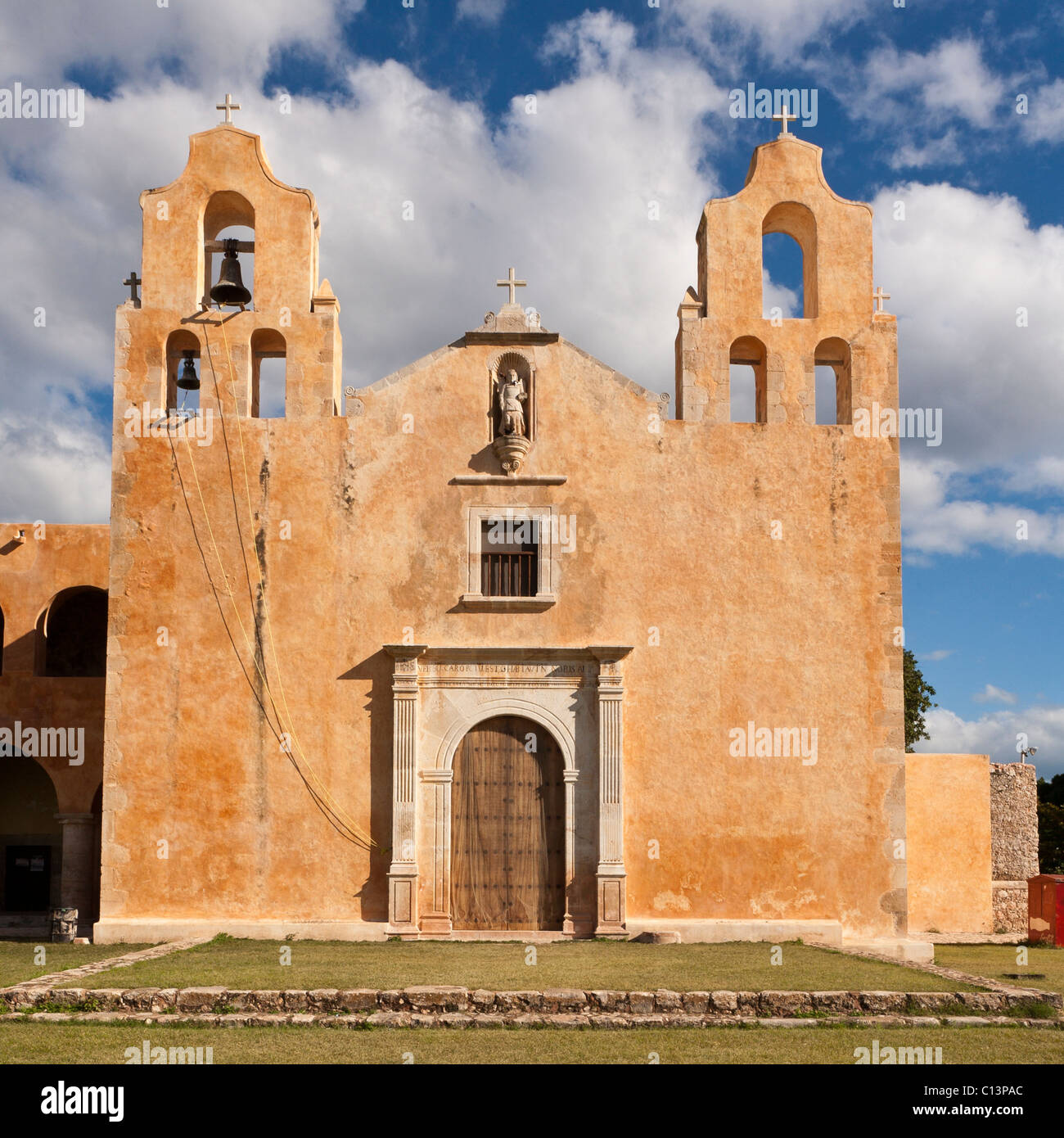 Front Facade of the Franciscan Church in Mani square. Ocher adobe, a ...