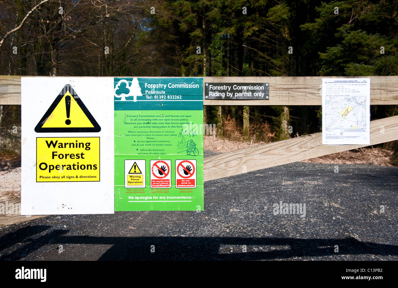 Warning signs on a gate, which leads into a Forestry Commision ...
