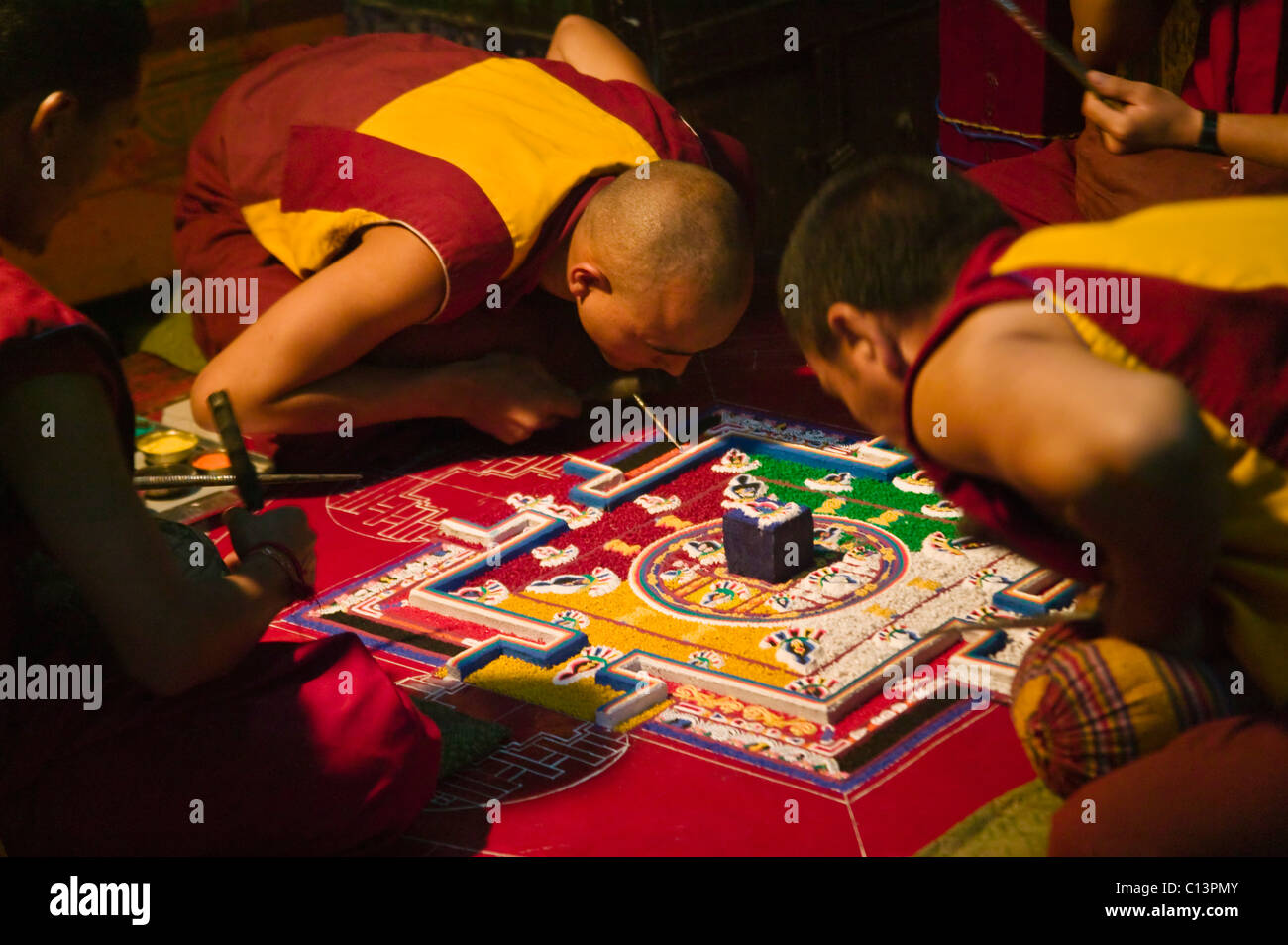 Monk praying with Mangala in Phyang Gompa, Ladakh, India Stock Photo ...
