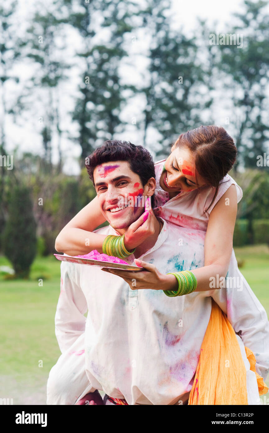 Couple celebrating Holi Stock Photo - Alamy