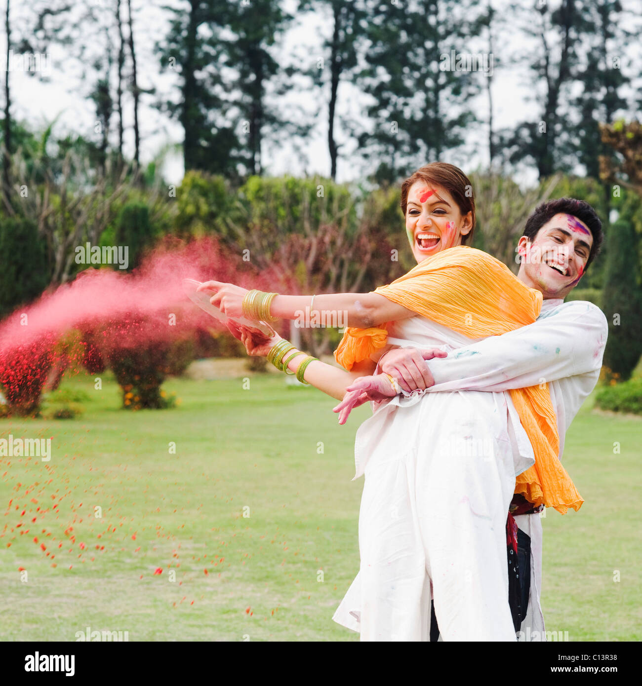 Couple celebrating Holi Stock Photo - Alamy